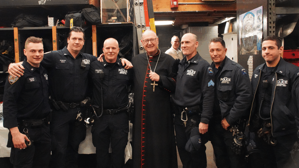 Cardinal Dolan Celebrates Mass for NYPD Precinct 13 on Christmas Eve ...